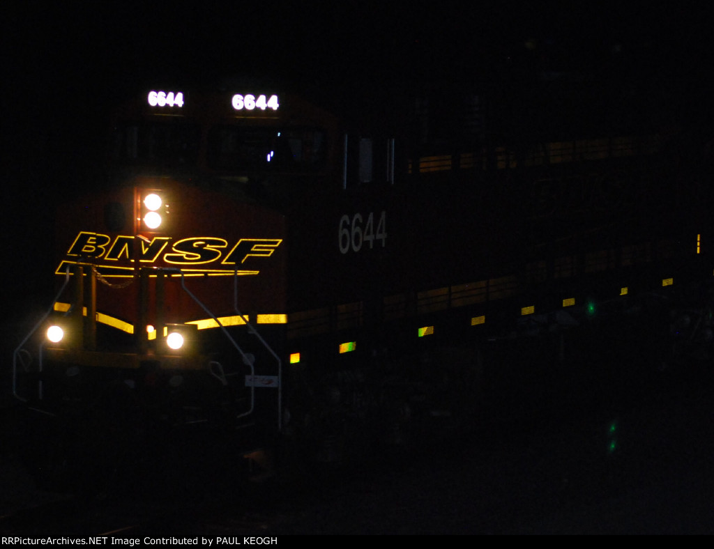 BNSF 6644 heads west in this close up night flash shot.
